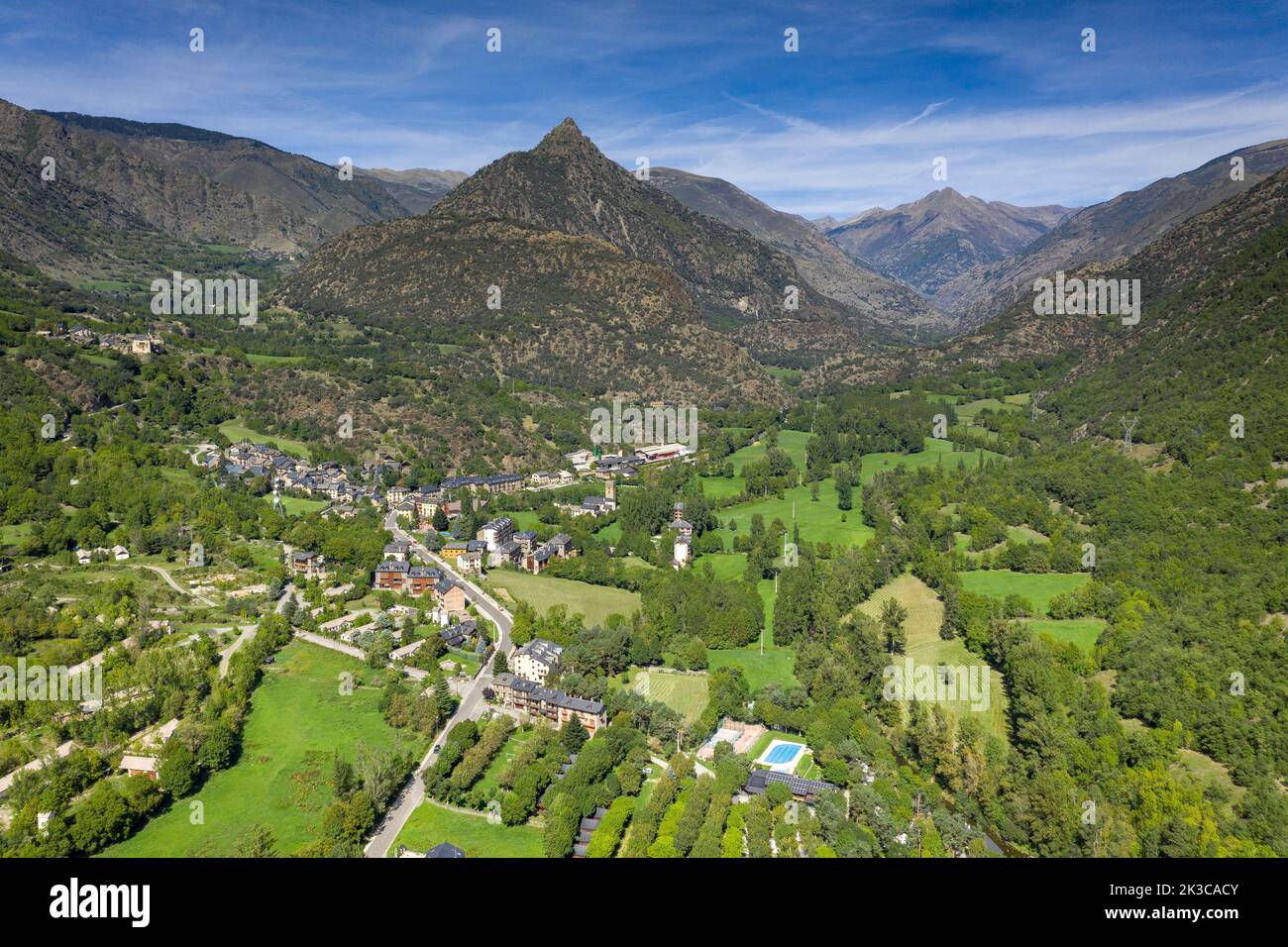 Aerial view of Ribera de Cardós and the surrounding green fields in the ...