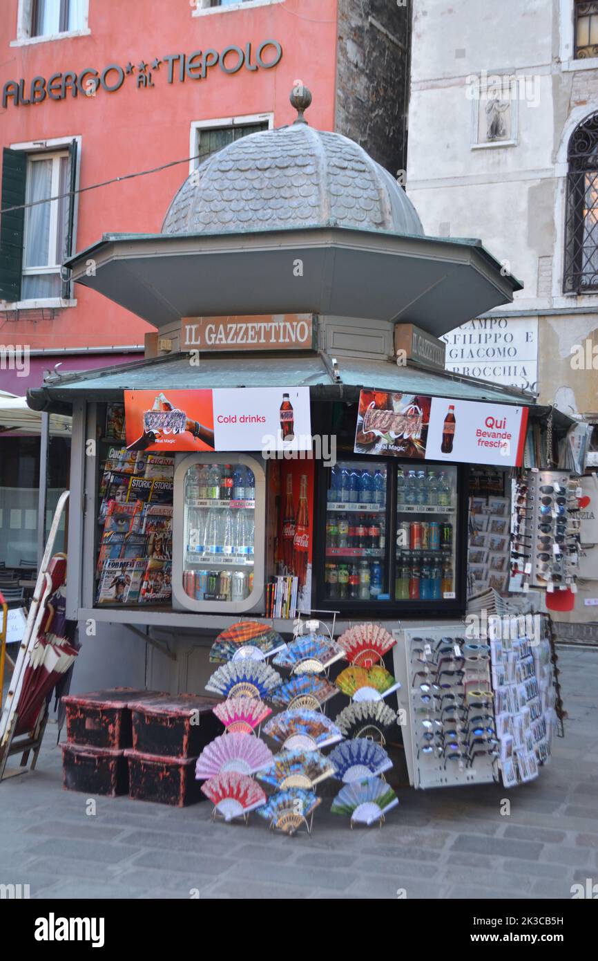 Venice,Italy- kiosk full of various newspapers on a small street in ...