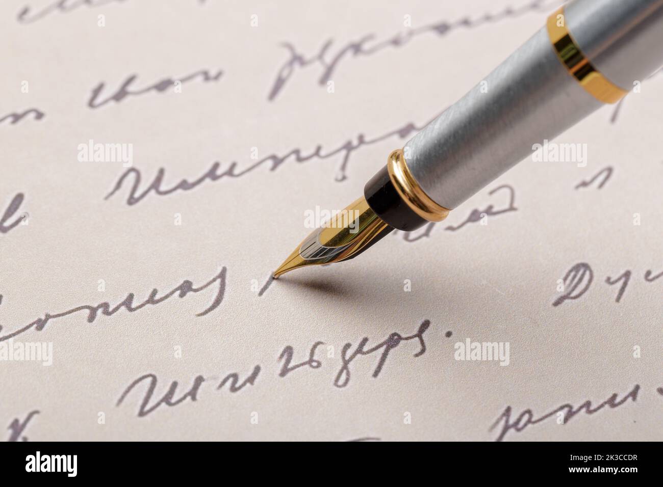 Fountain Pen on Written Page Stock Photo - Alamy