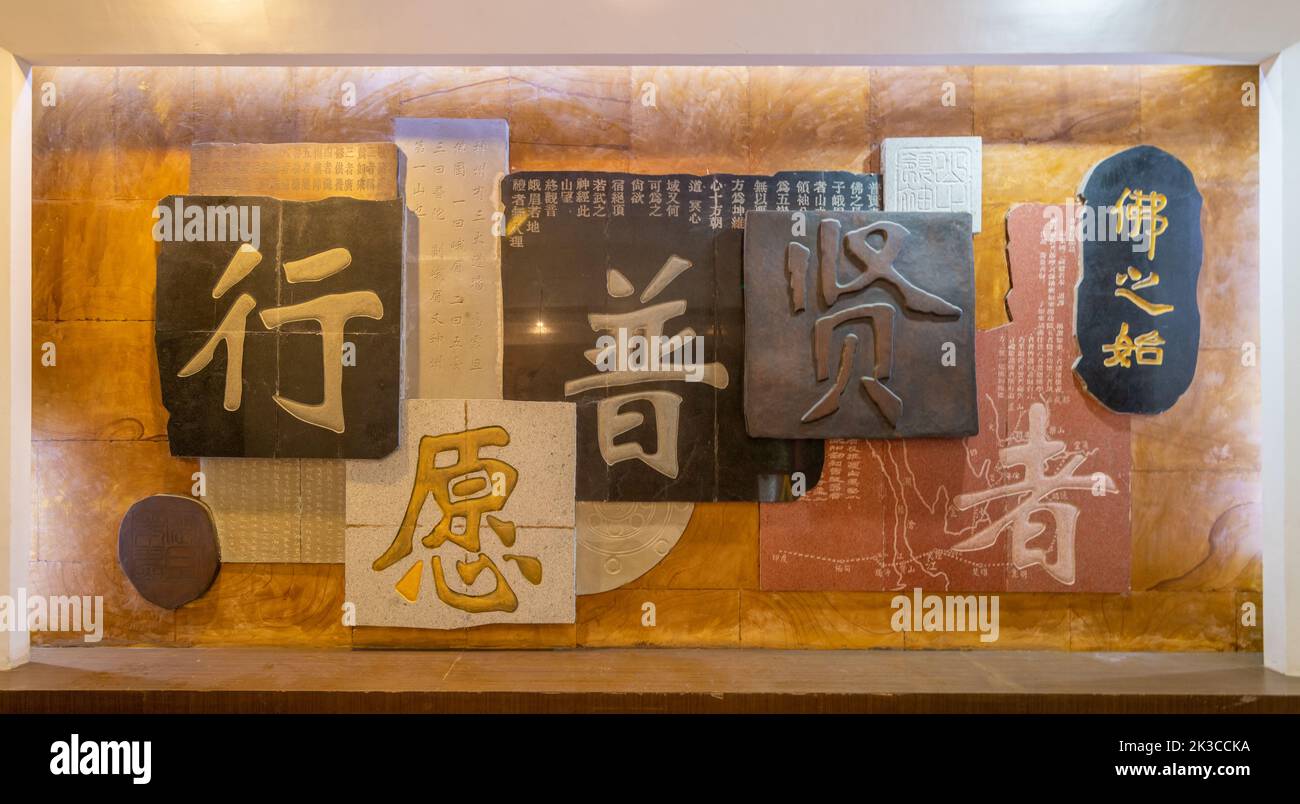 A landscape of ancient pagan buildings at the foot of a mountain in ...