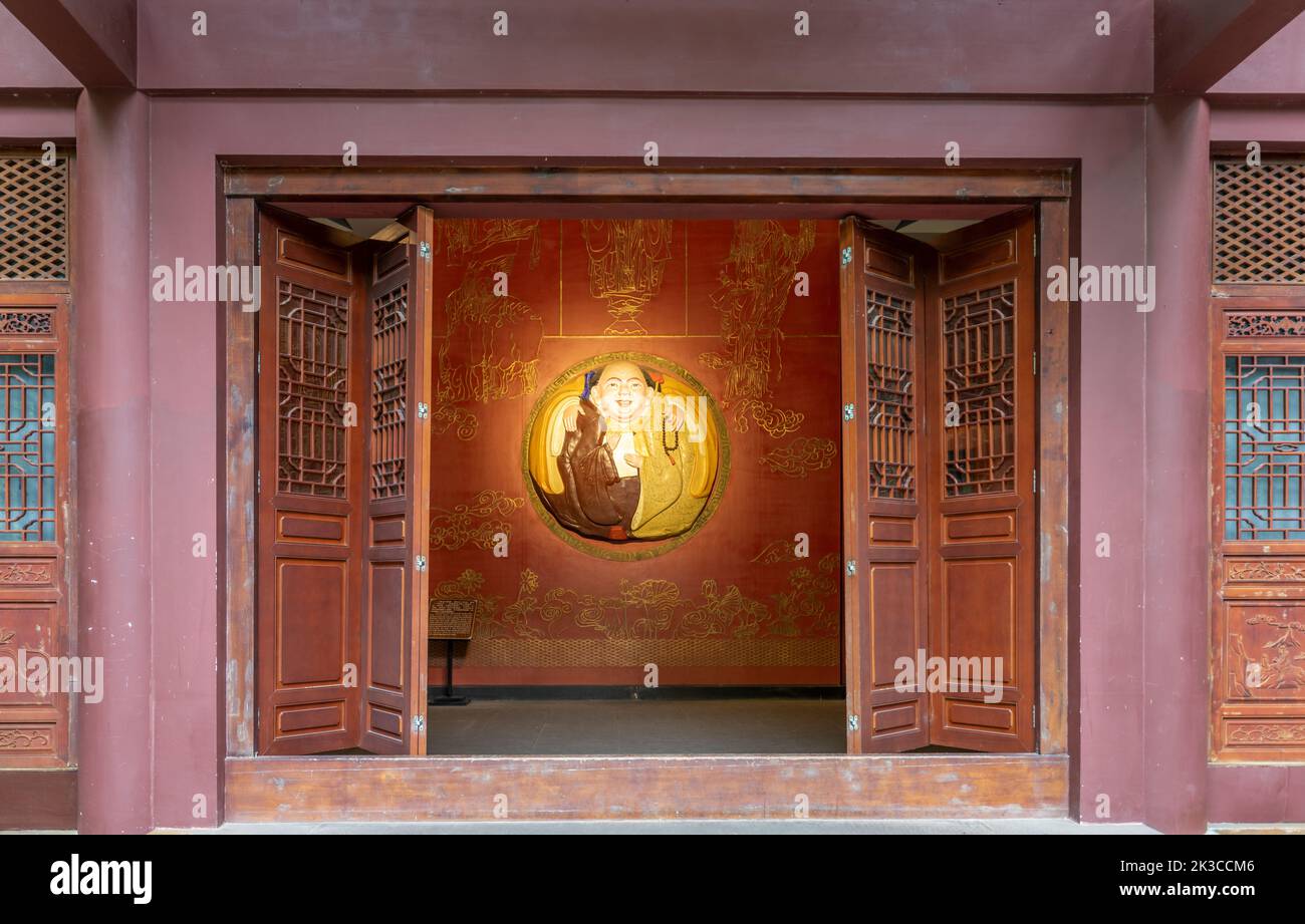 A landscape of ancient pagan buildings at the foot of a mountain in ...