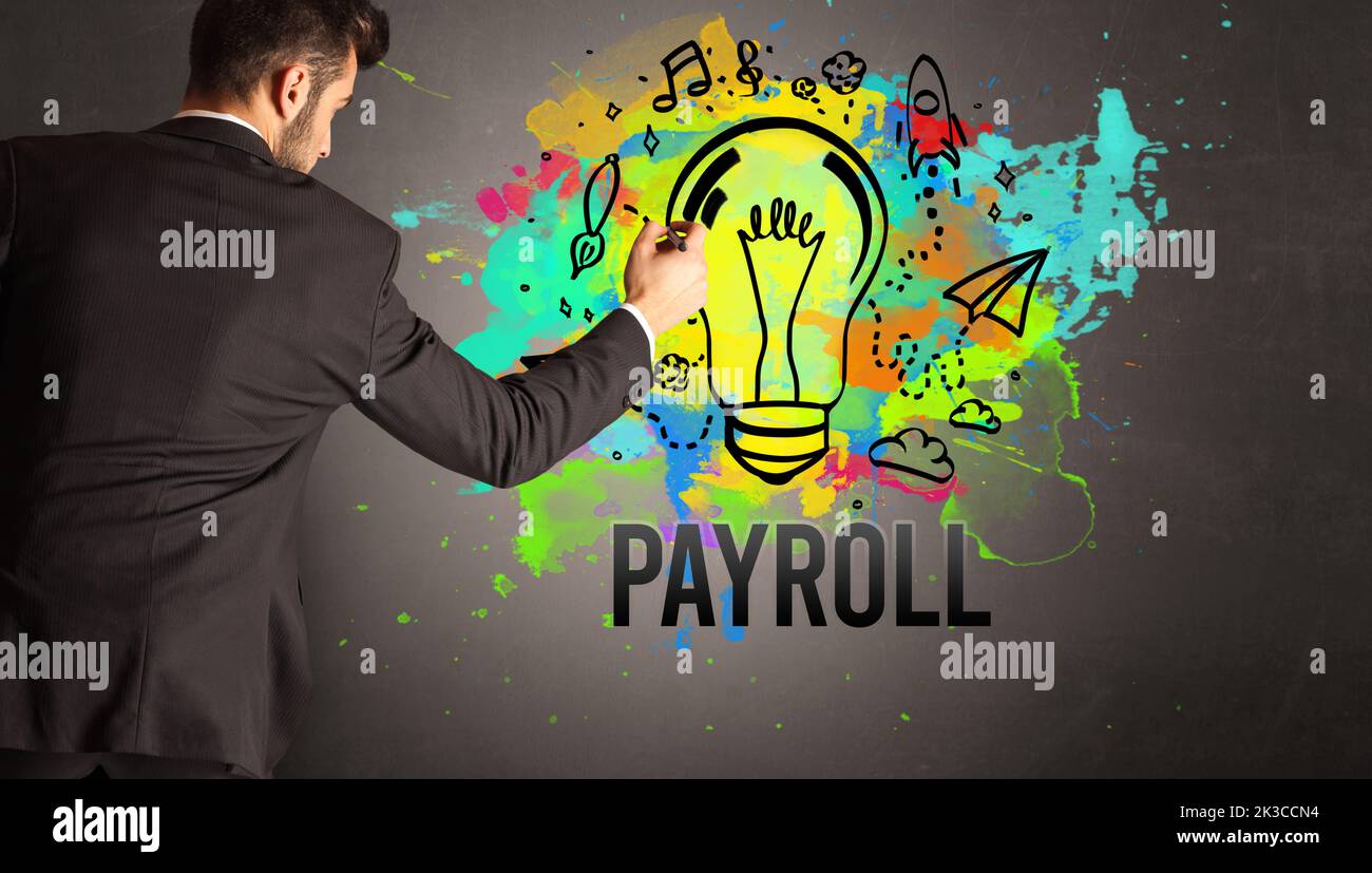 businessman drawing colorful light bulb Stock Photo - Alamy