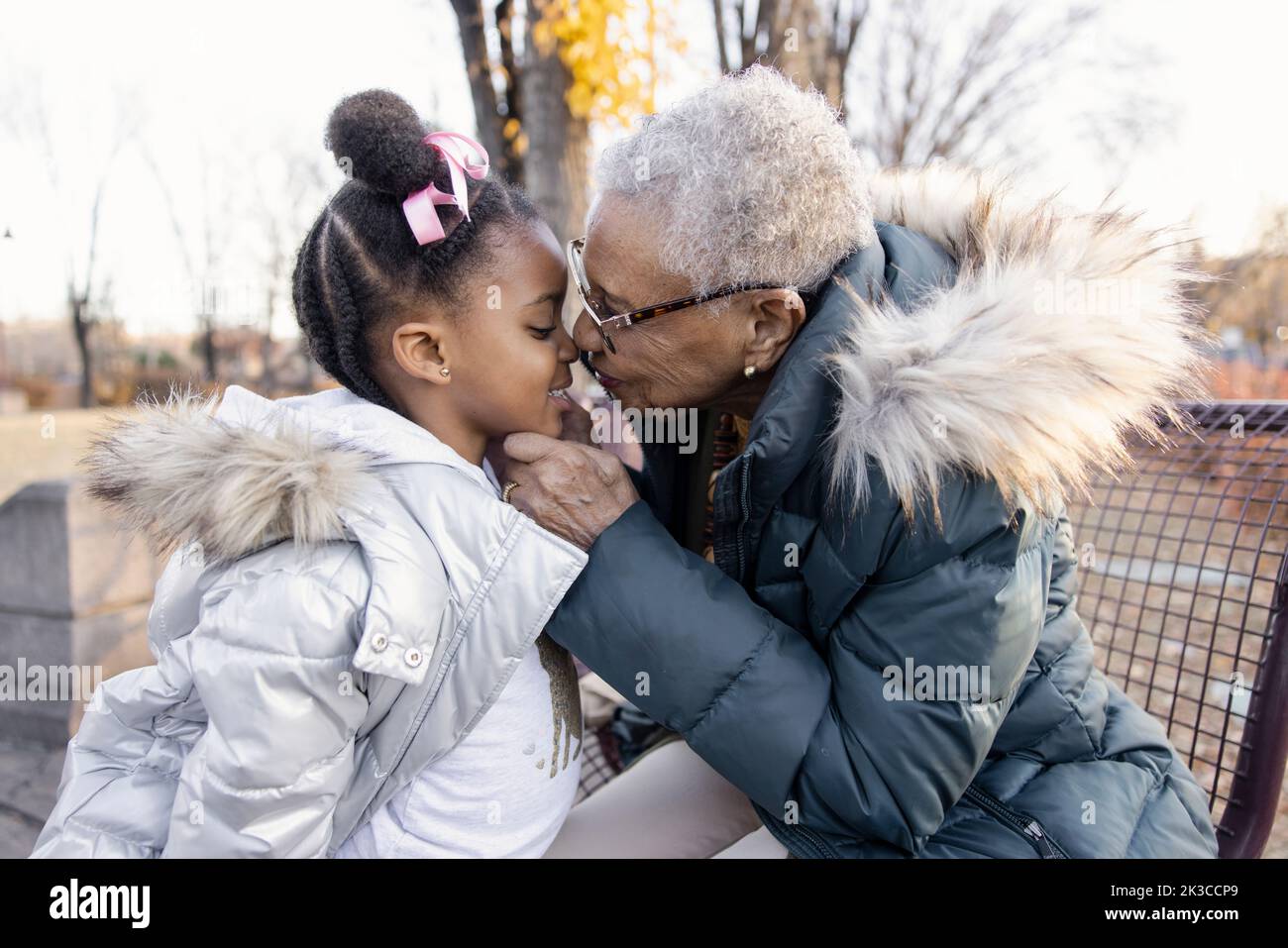 Girl rubbing noses with her grandmother hi-res stock photography and images - Alamy