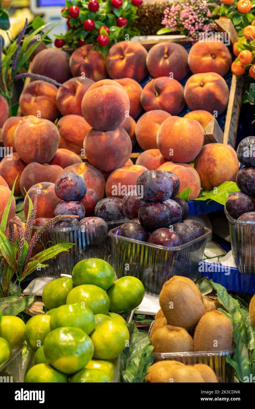 Fruit and vegetable market counter. Fresh a variety of fruits lie on ...