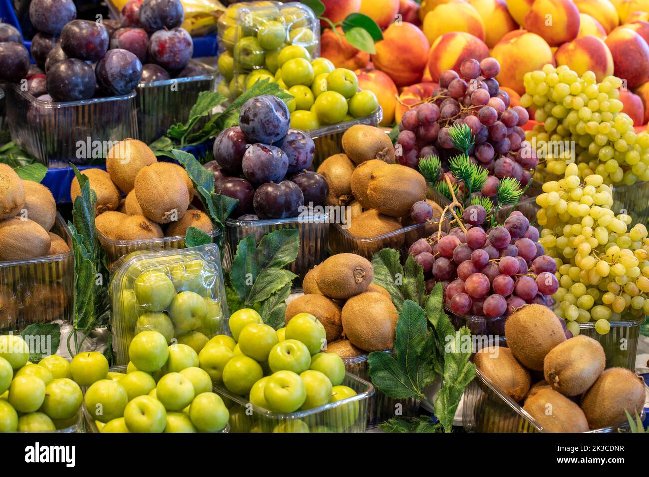 Fruit and vegetable market counter. Fresh a variety of fruits lie on ...