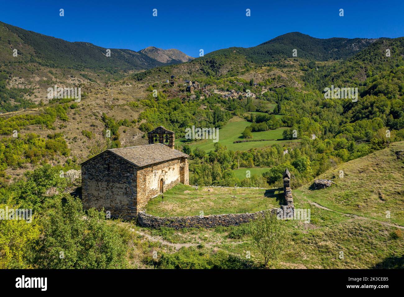 Aerial view of the church of Santa Eulàlia, the village of Alendo and ...