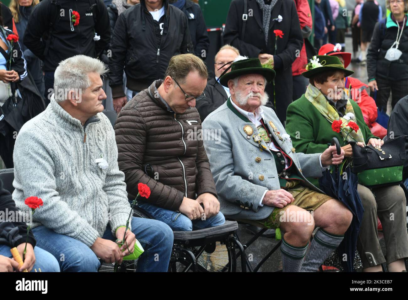 Munich, Germany. 26th Sep, 2022. Victims sit at the memorial for the ...