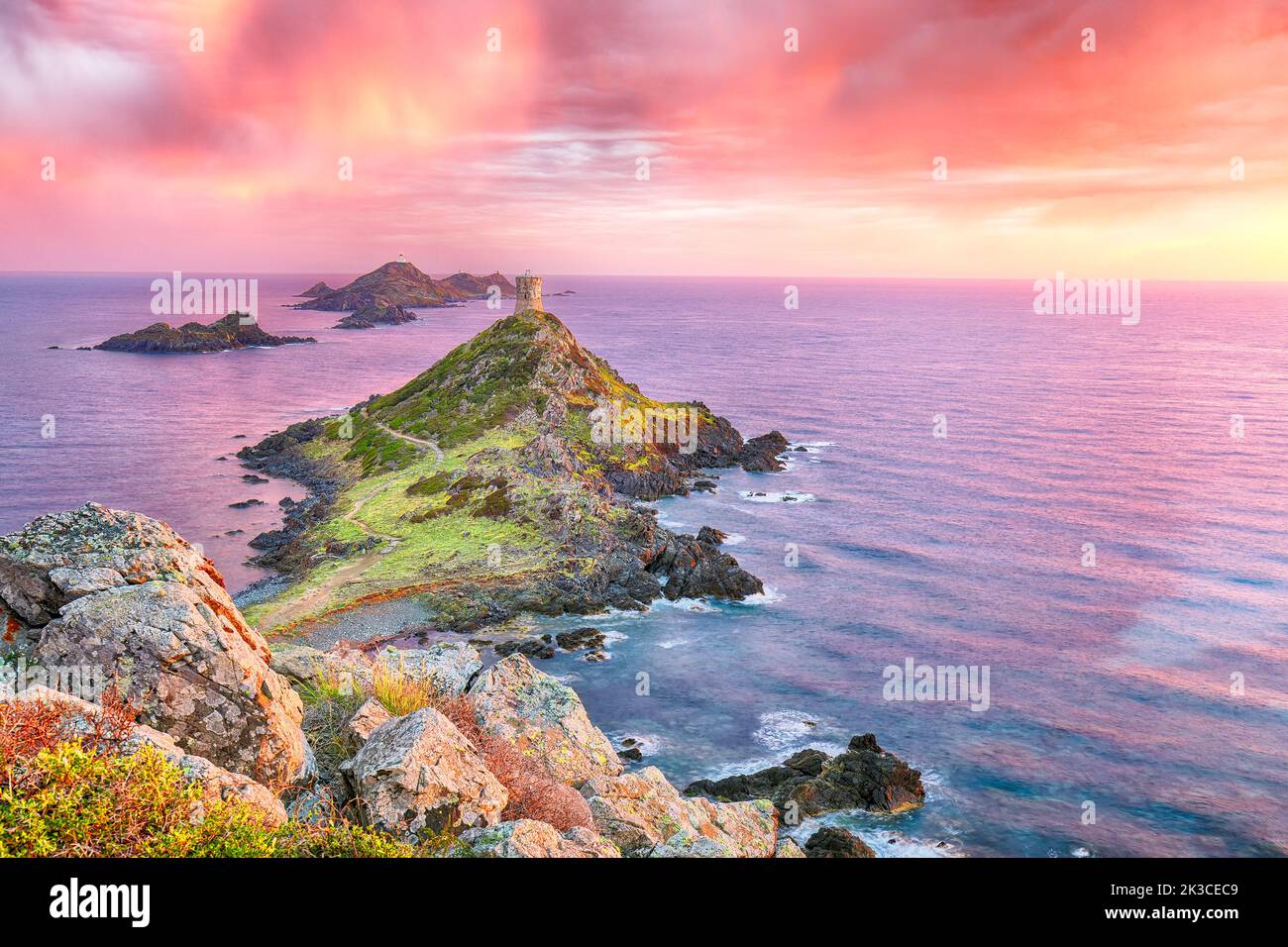 Sunset over popular tourist destination Torra di a Parata with Genoese ...