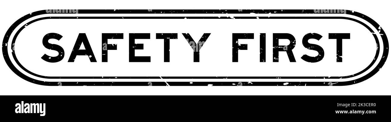 Grunge black safety first word rubber seal stamp on white background ...