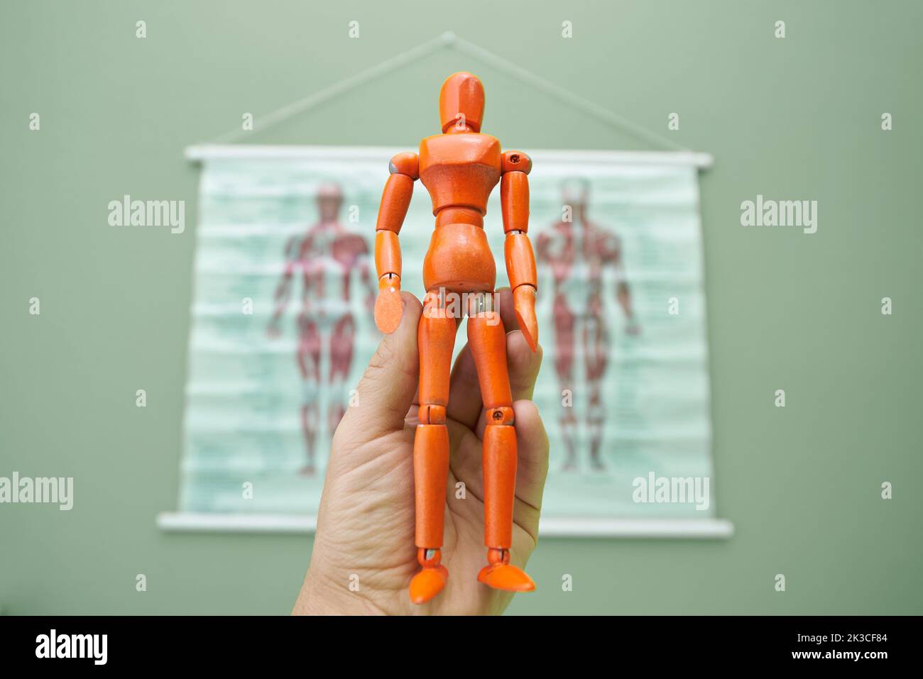 Wooden man figurine in the medical office. Health care concept Stock ...