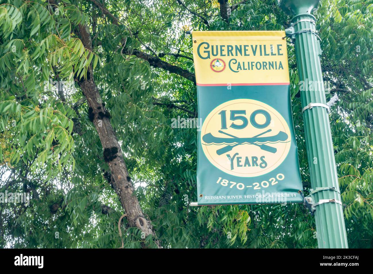 A sign attached to a lamppost in Guerneville, California commemorating ...