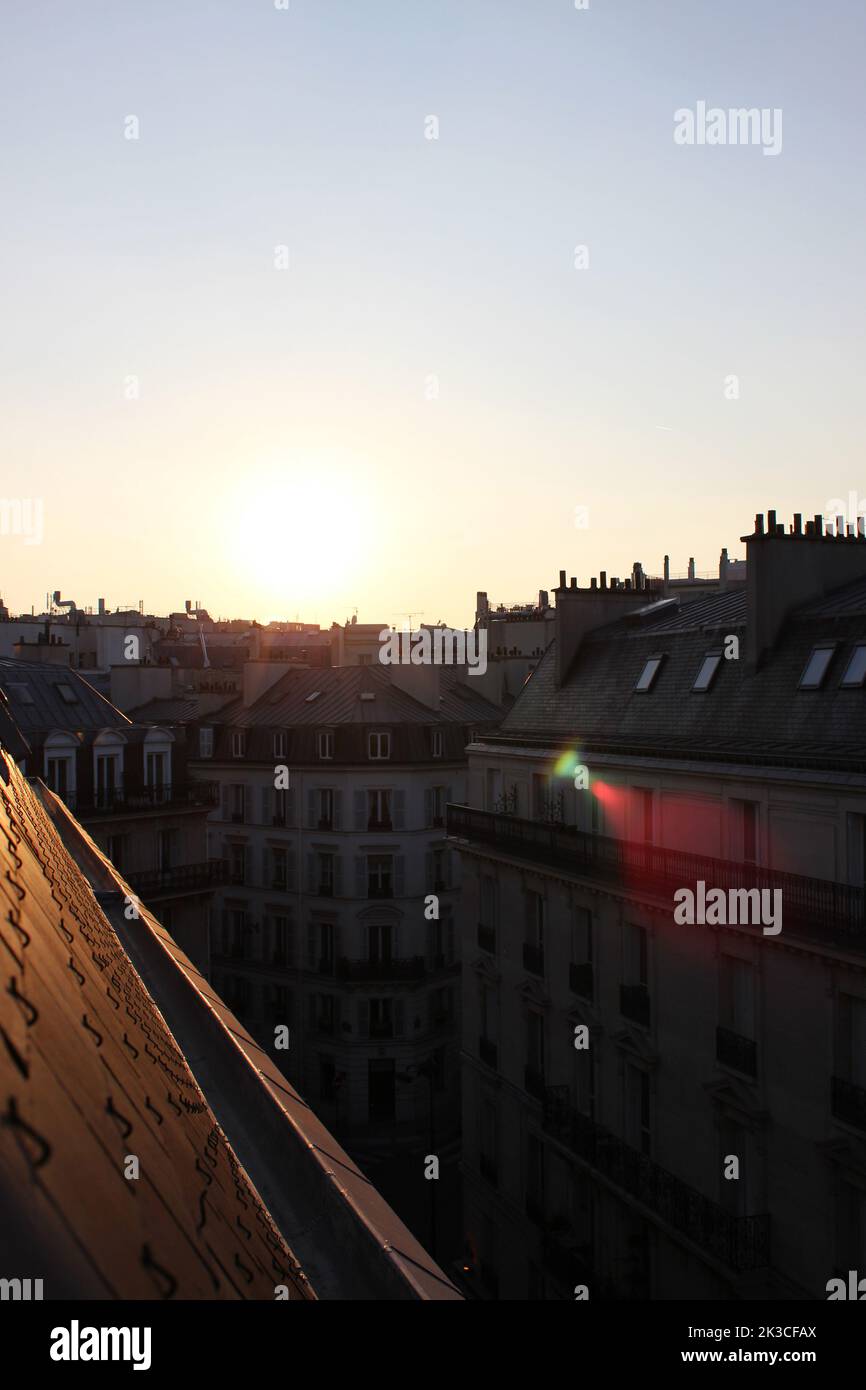Sunset in Paris. Parisian Buildings Rooftop View in Sunset Rays ...