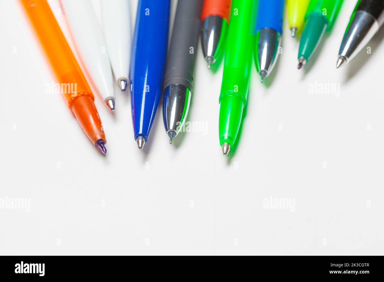 different colors pens isolated on the white background Stock Photo - Alamy