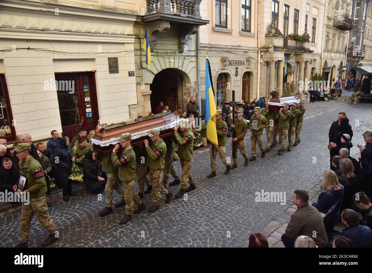 Lviv, Ukraine. 24th Sep, 2022. Soldiers carry coffins during the ...