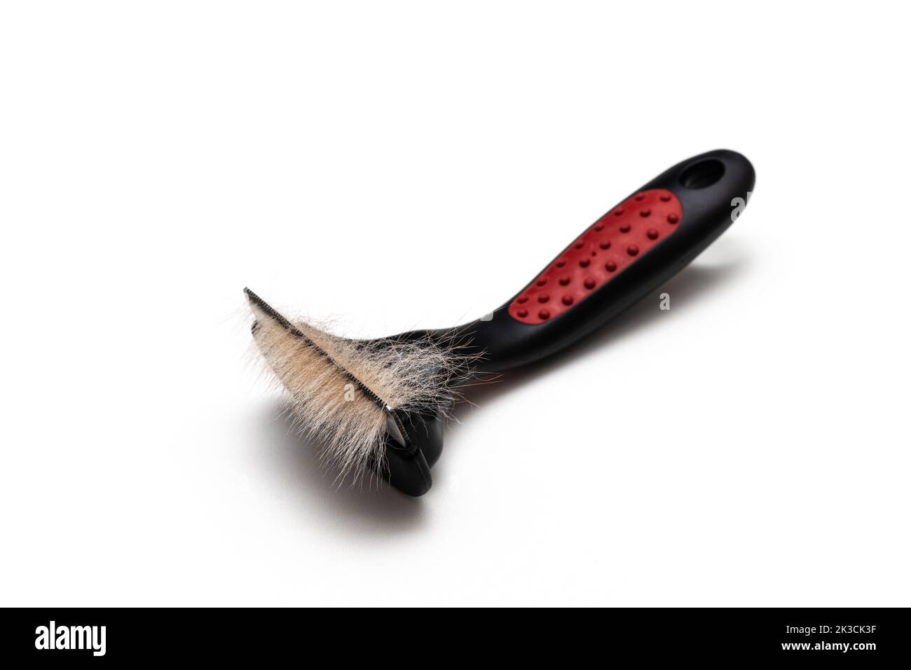 comb for combing wool from animals on a white background. wool comb ...