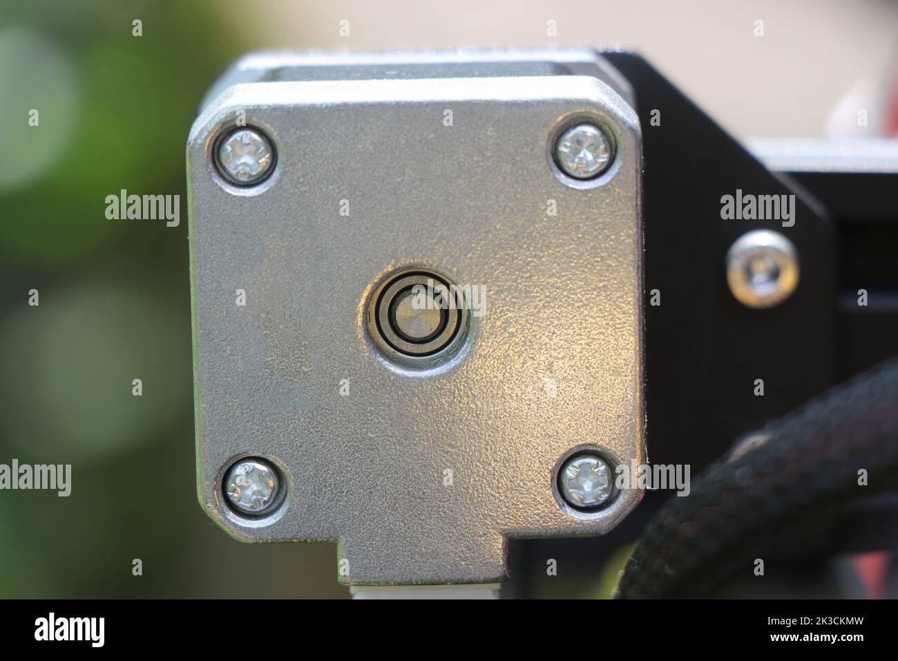 Stepper motor back side view with view of its shaft and its bearings ...