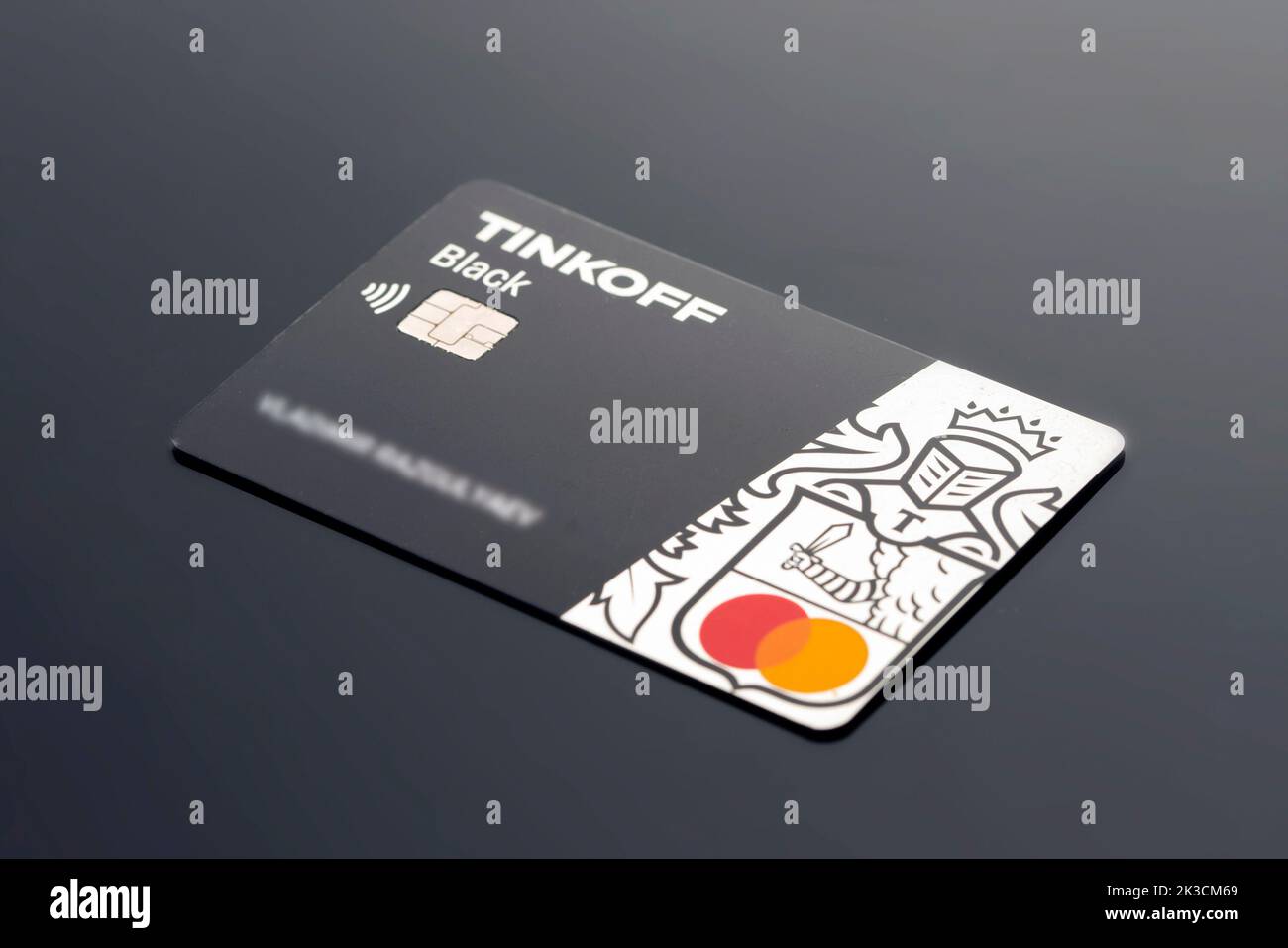 Tinkoff Bank plastic credit debit card close-up on black background ...