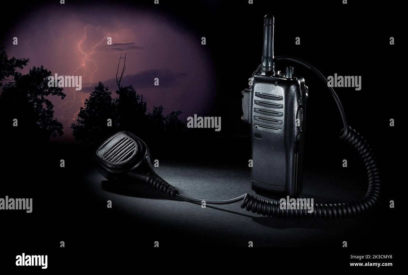 Microphone and two way radio with approaching storm Stock Photo - Alamy