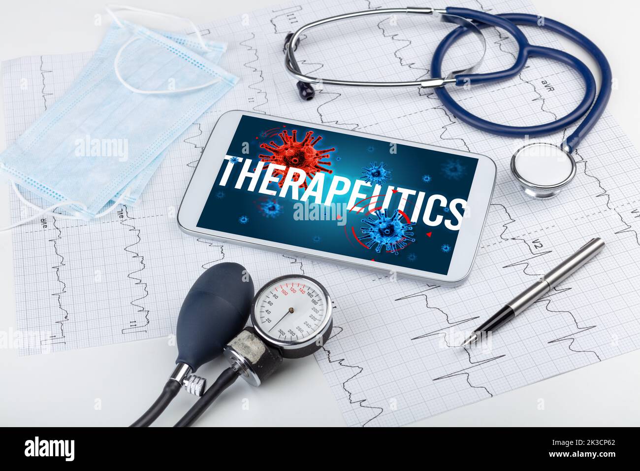 Tablet pc and doctor tools on white surface Stock Photo - Alamy