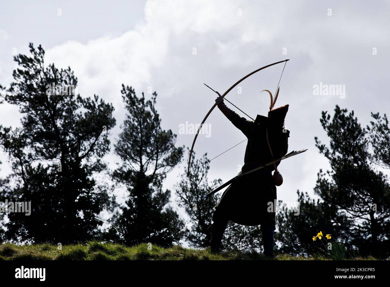 Interpretation of English folk hero Robin Hood shooting arrow from ...