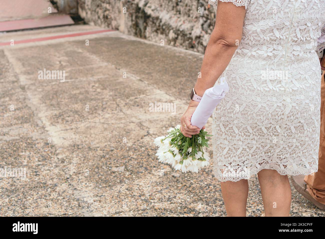Bride leaving the wedding ceremony Stock Photo - Alamy