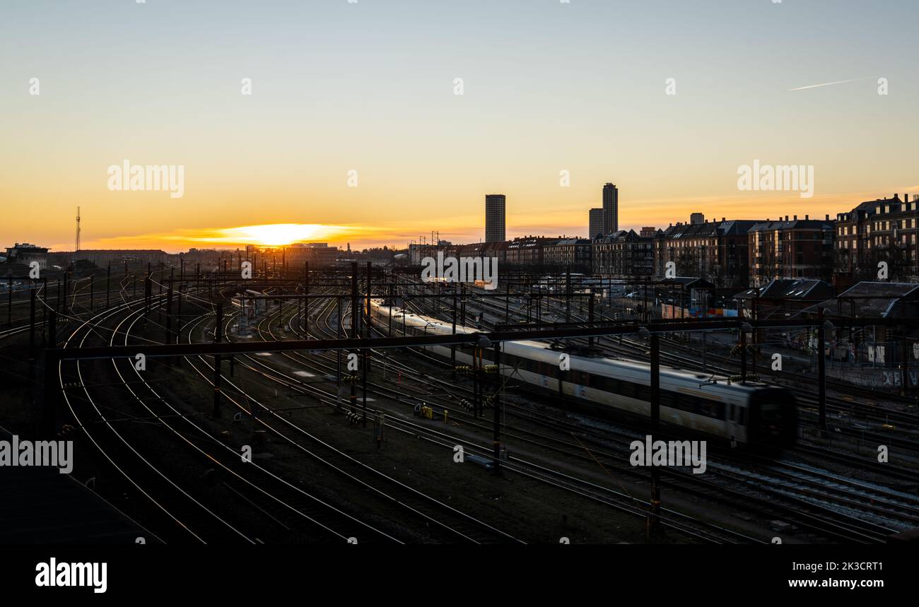 A beautiful scenery of a big train station surrounded by residential ...