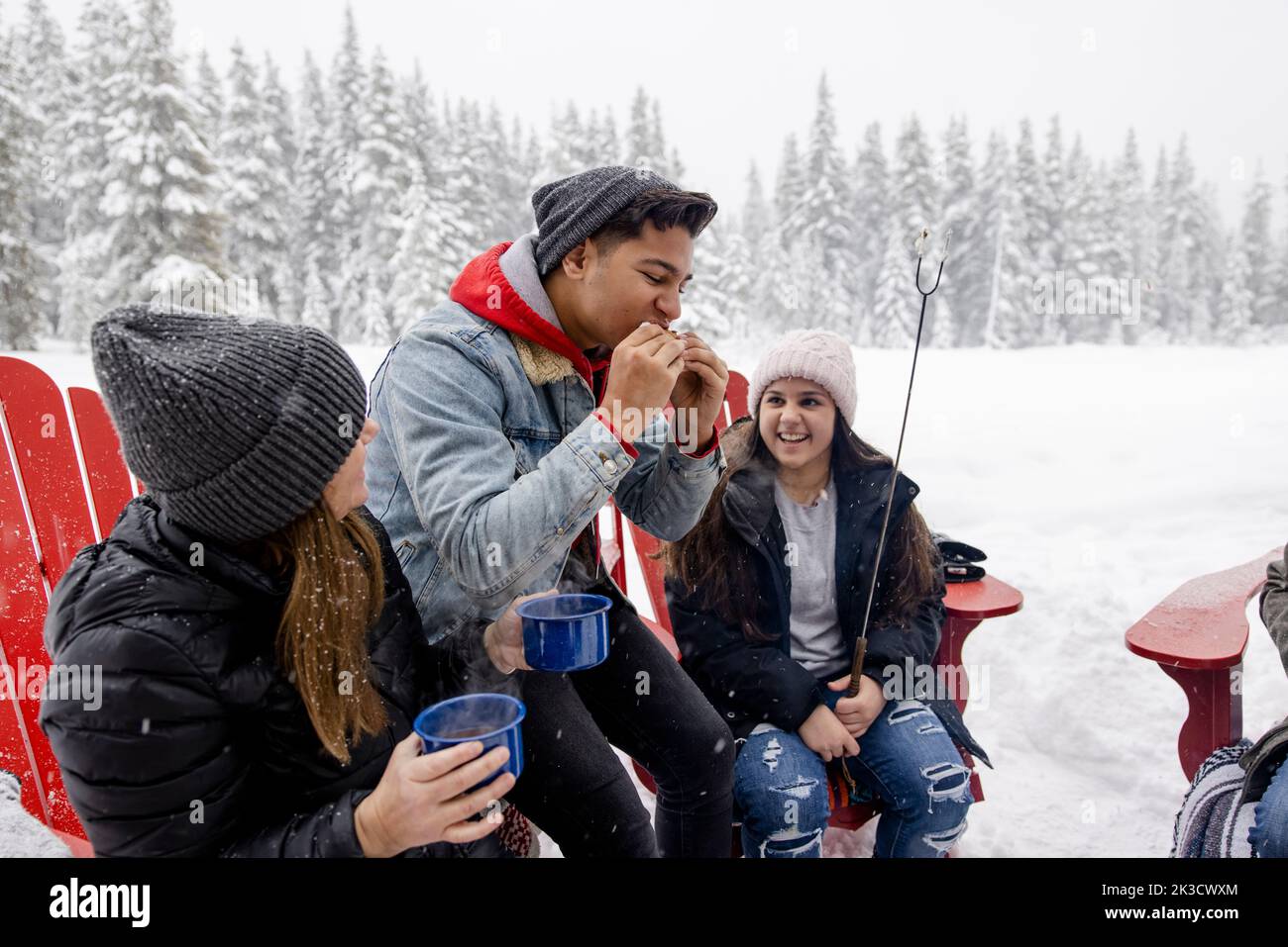 Boy eating smores hi-res stock photography and images - Alamy