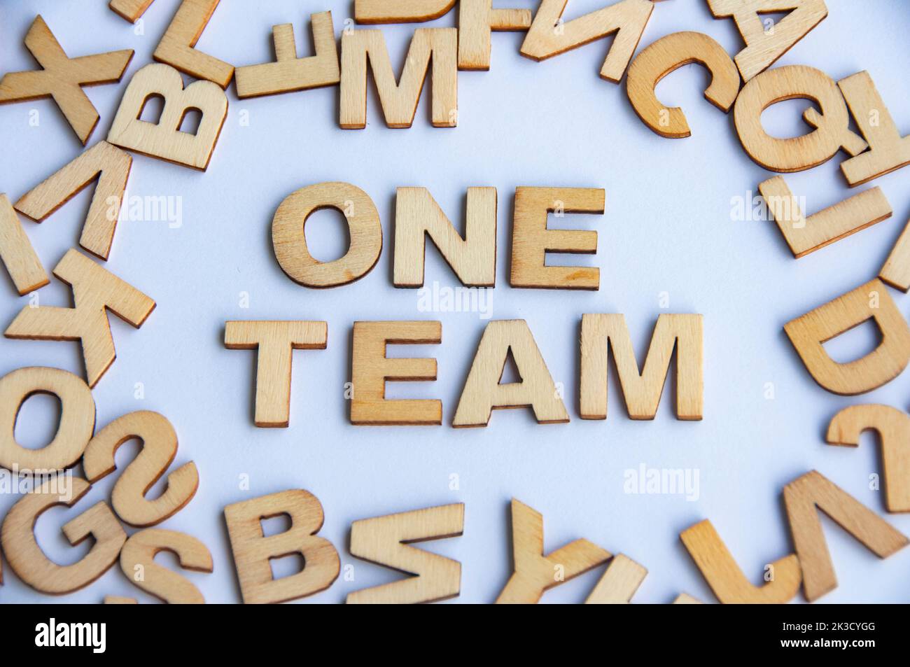 One team wooden text on while cover background. Teamwork concept Stock ...