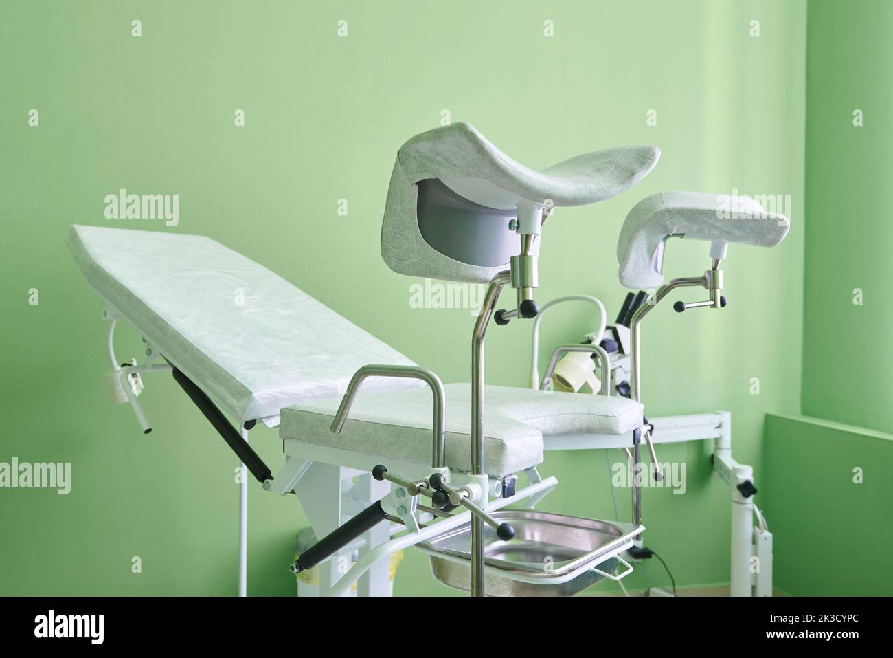 Gynecological examination chair in clinic Stock Photo - Alamy