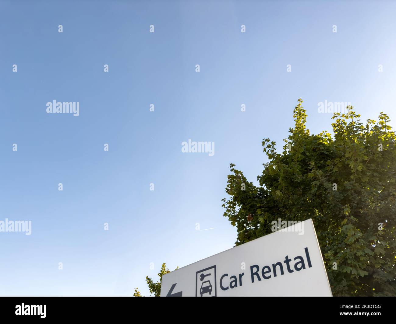 Low angle view of Car Rental sign with car and key pictogram as seen ...