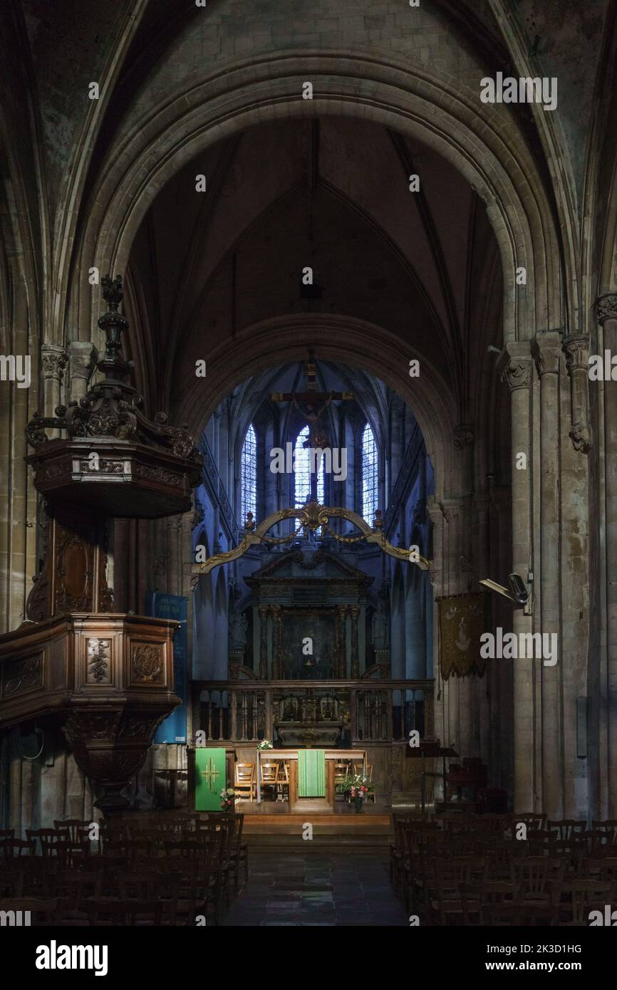 Interior of the Church of Notre-Dame with altar and colorful windows in ...