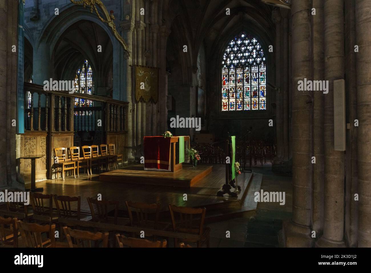 Interior of the Church of Notre-Dame with altar and colorful windows in ...