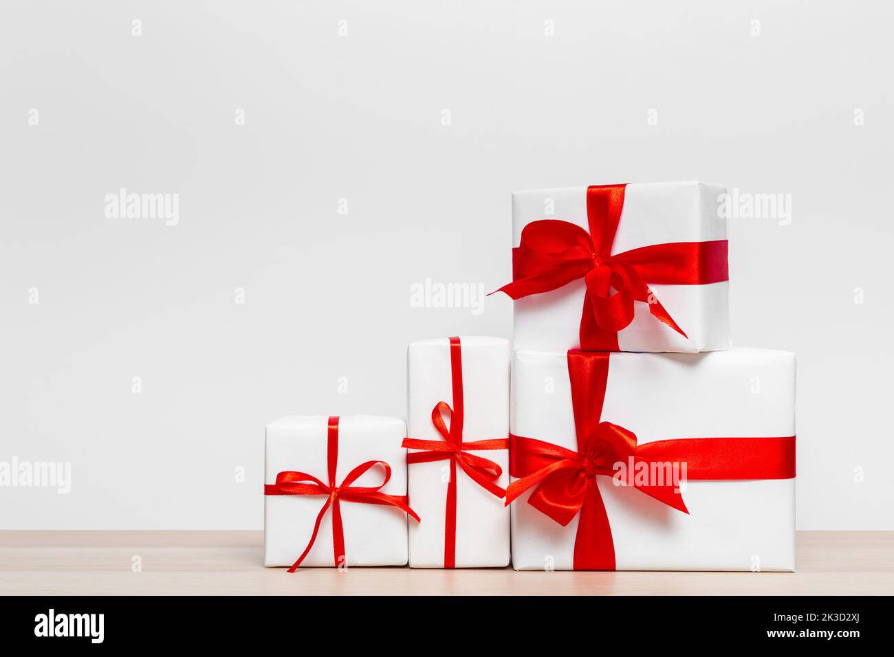 Christmas gift box on tablet Stock Photo - Alamy
