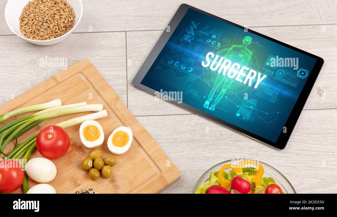 Tablet Pc with fruits, medical concept Stock Photo - Alamy