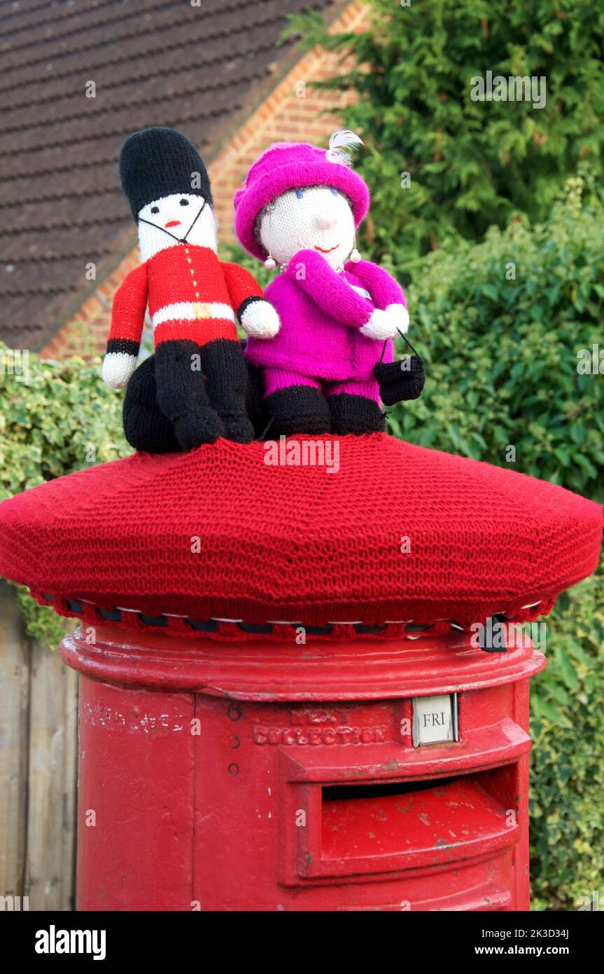 Quirky colourful handmade knitted woollen hat decorates a traditional ...