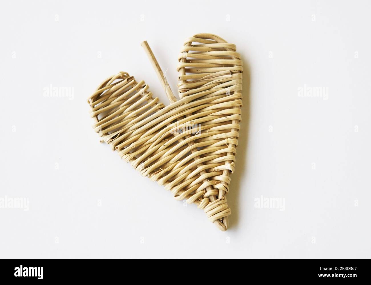 A top view of a heart-shaped decoration mate of thatch Stock Photo - Alamy