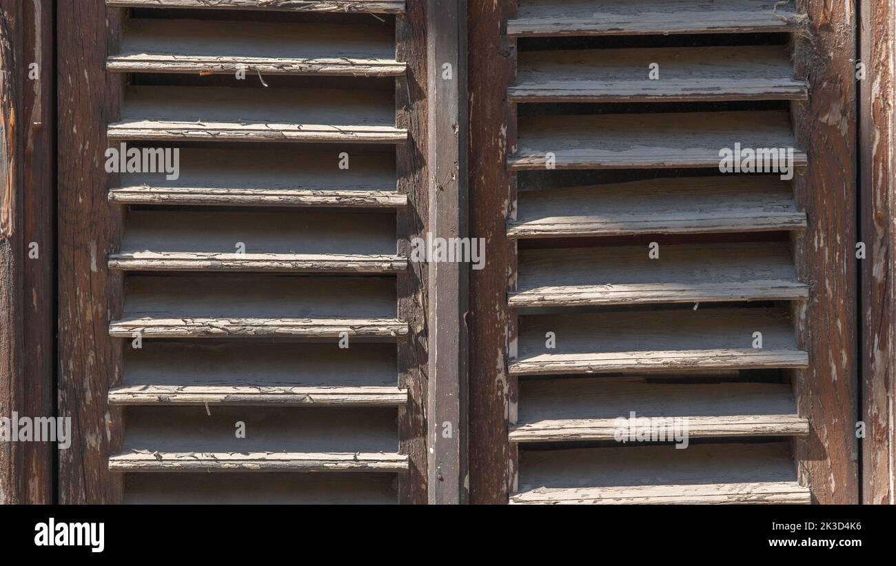 Old dilapidated wooden shutters it in the form of a lattice Stock Photo ...