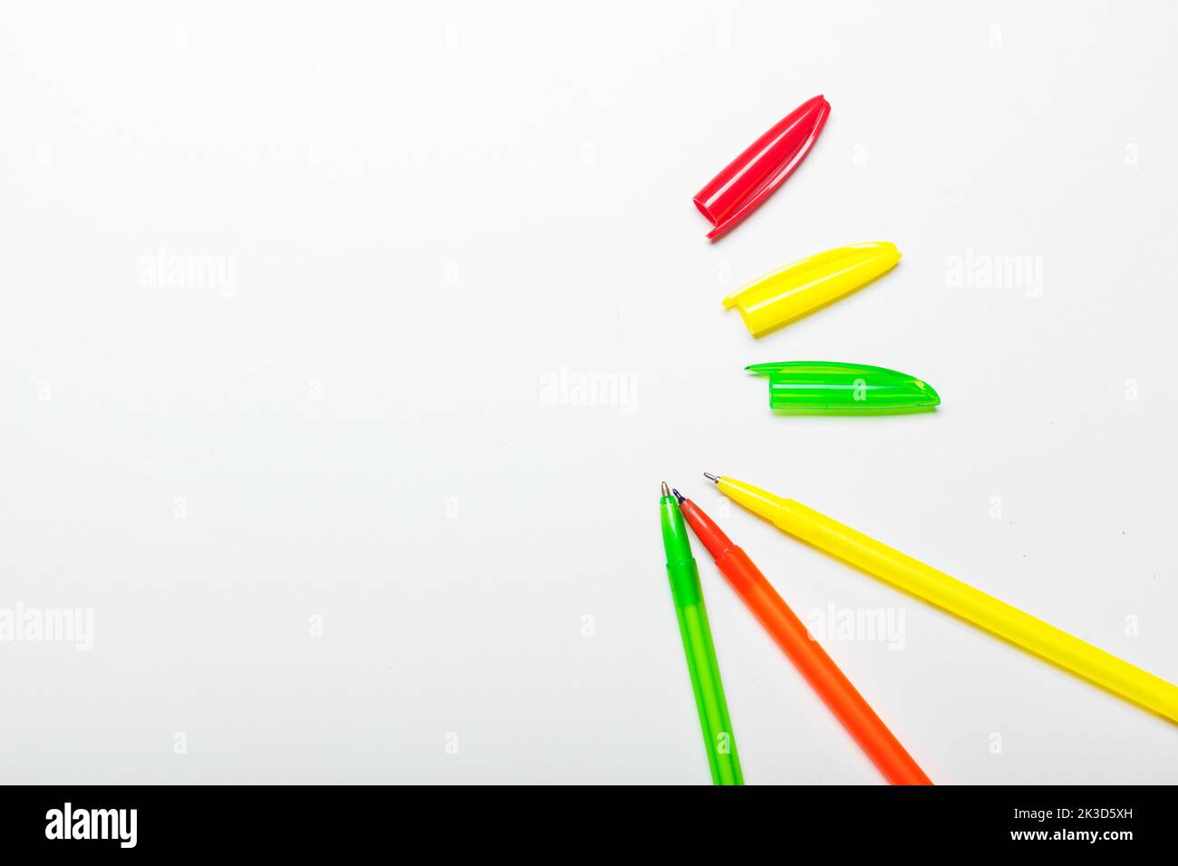 different colors pens isolated on the white background Stock Photo - Alamy