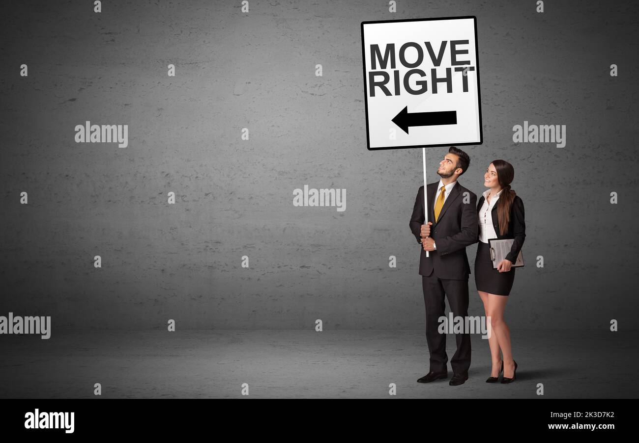 business person holding a traffic sign Stock Photo - Alamy