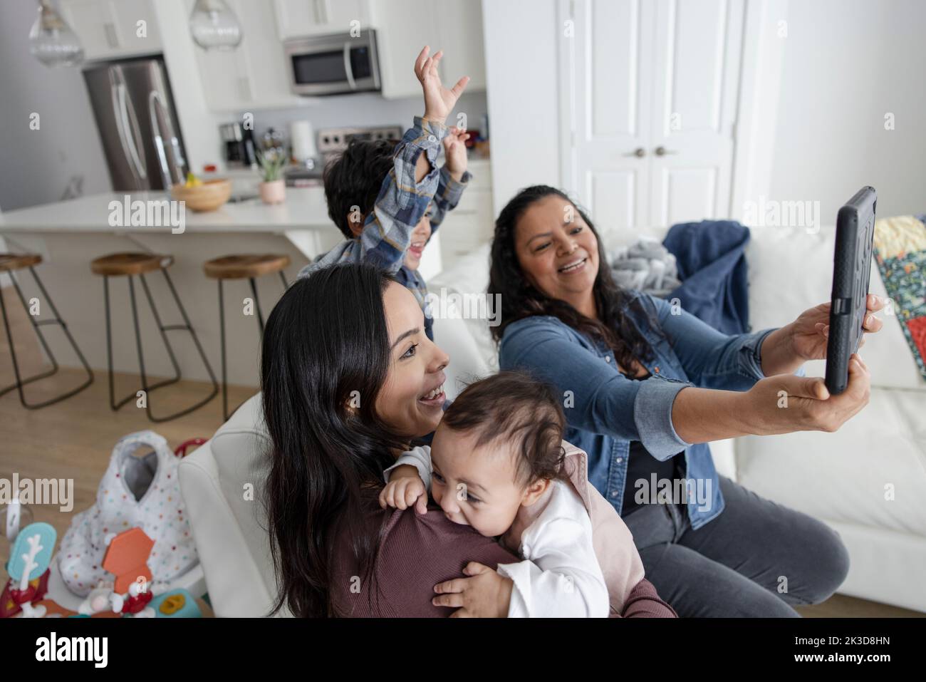 Adult video chatting with grandson hi-res stock photography and images ...