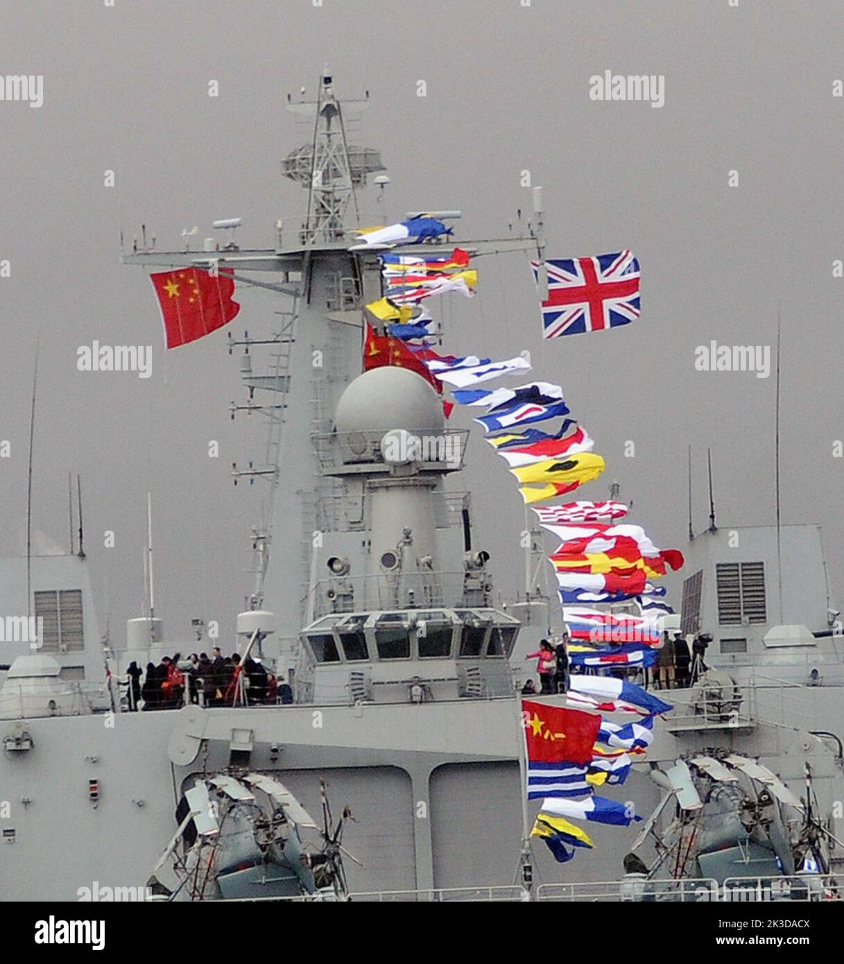 The Union Jack flies alongside the Chinese Flag on Chinese Assault ship ...
