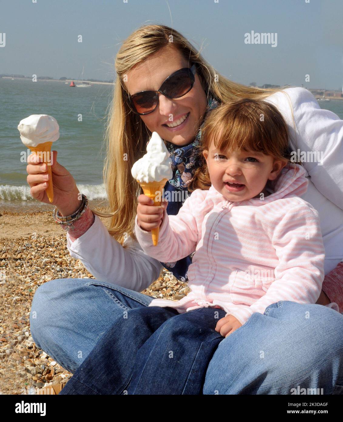 2 year old Jessie Bee enjoys an Easter Monday ice cream with her mum ...