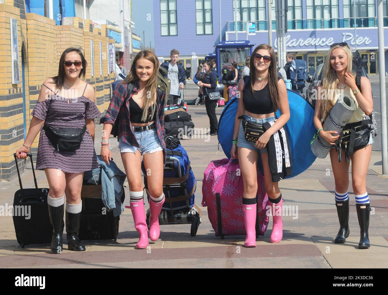 Four girls heading for the Isle of Wight Music Festival arrive at the ...