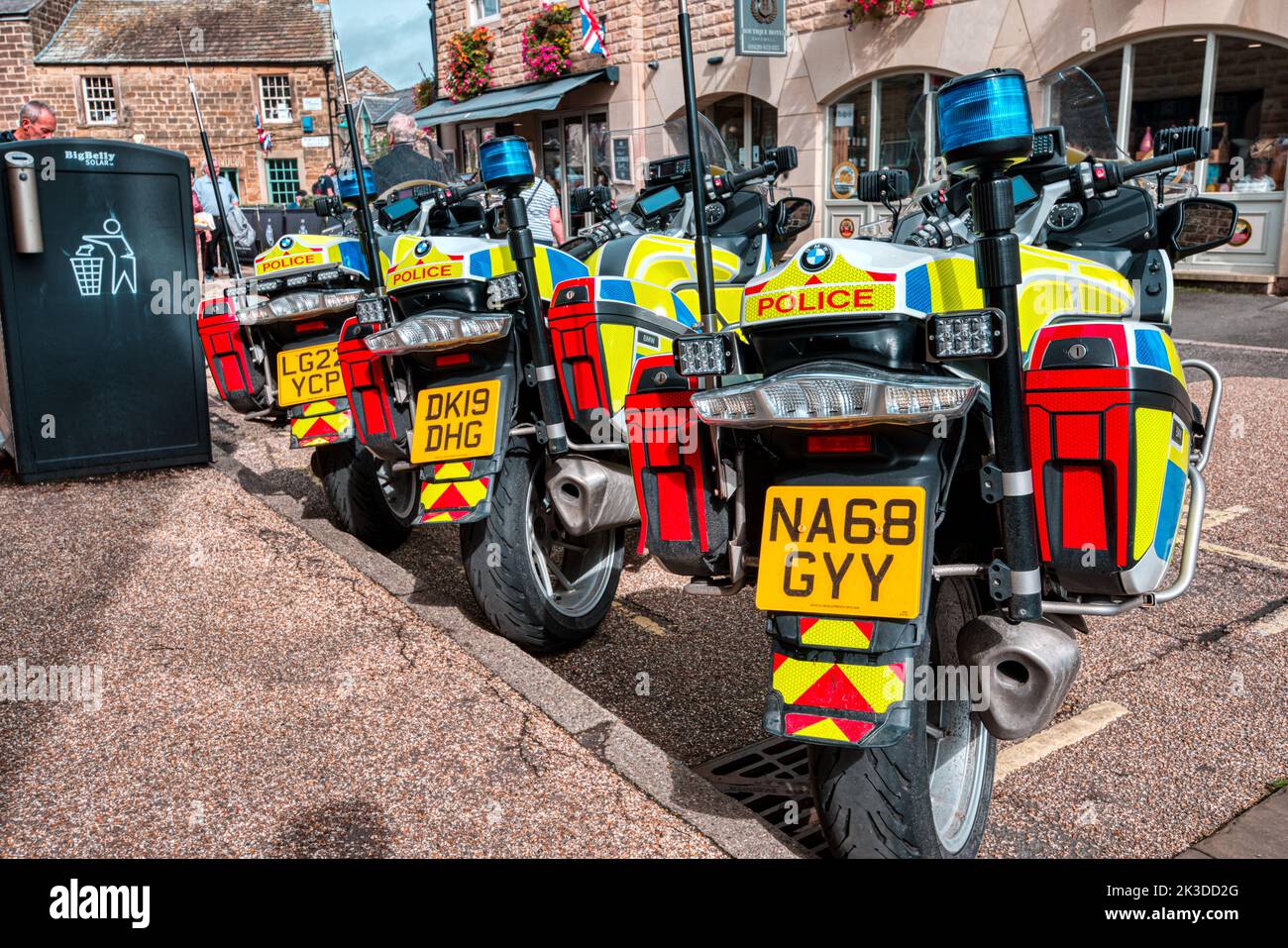 Three BMW police motorcycles parked in a line, Bakewell, Derbyshire, UK ...