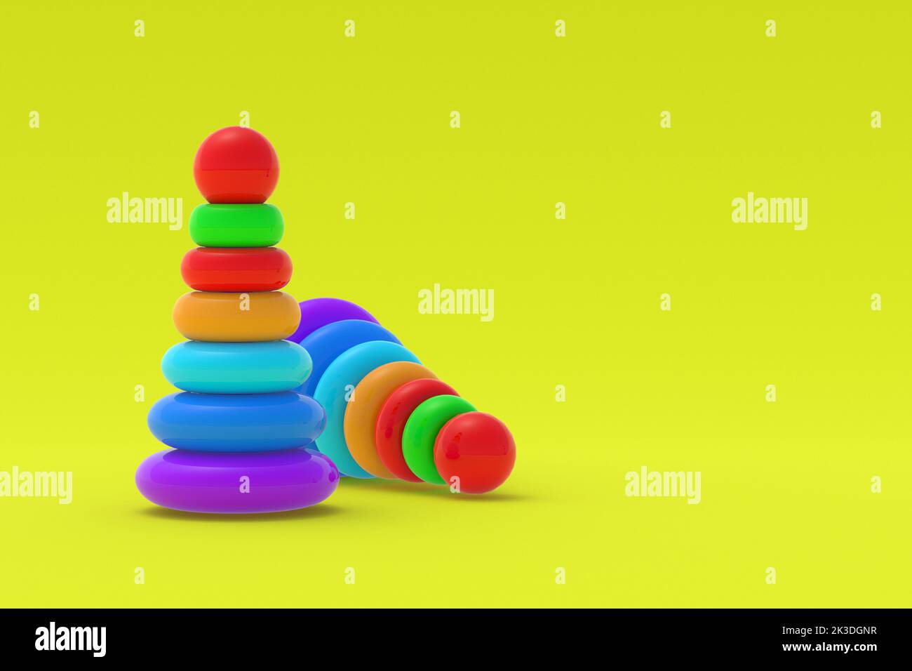 Pyramid toys on yellow background. Children education. Educational ...