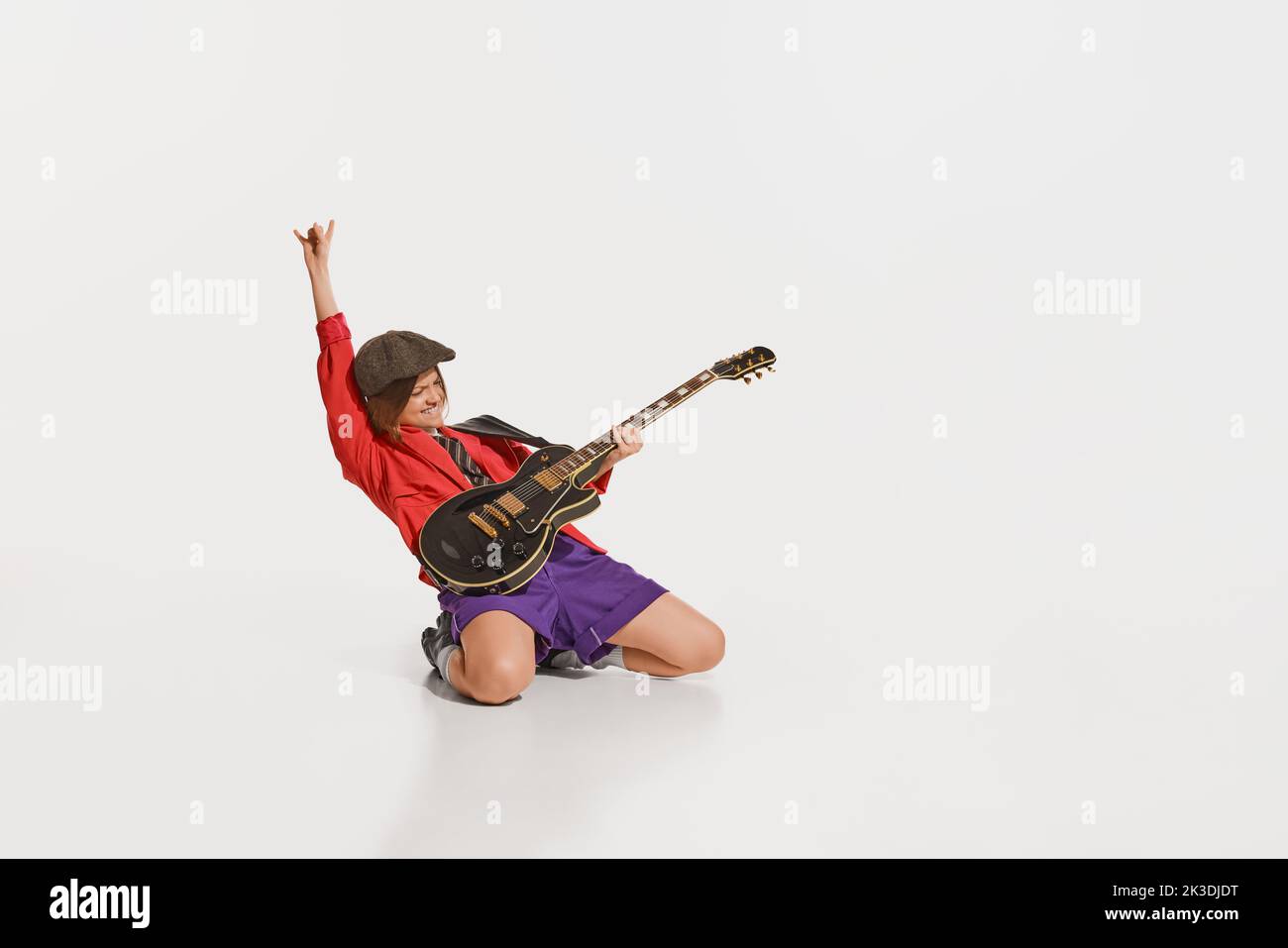 Stylish girl, retro musician wearing vintage style bright clothes ...
