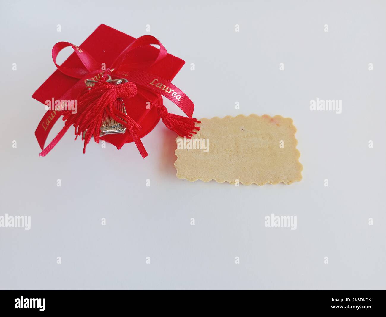 Close-Up Graduation Diploma With Red Color Gift book. Graduation ...