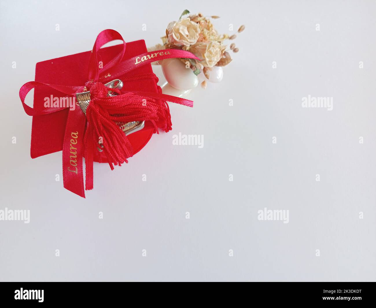 Close-Up Graduation Diploma With Red Color Gift book. Graduation ...