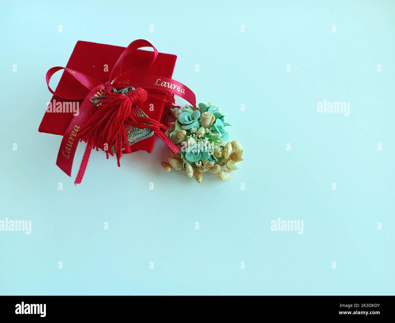 Close-Up Graduation Diploma With Red Color Gift book. Graduation ...