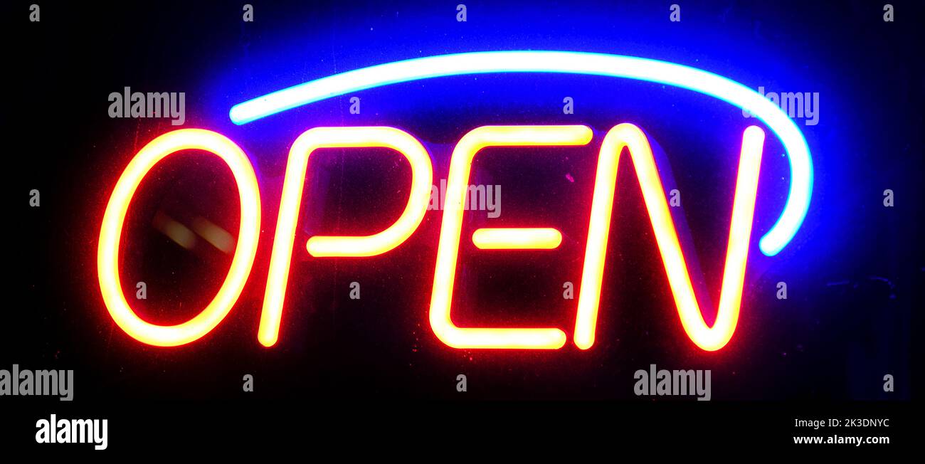 Open sign neon on glass window or door for business at night glowing ...